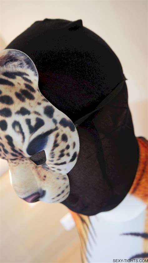 Solo Hottie Loves Posing In Her Tight Tiger Outfit And Green Tights Photos