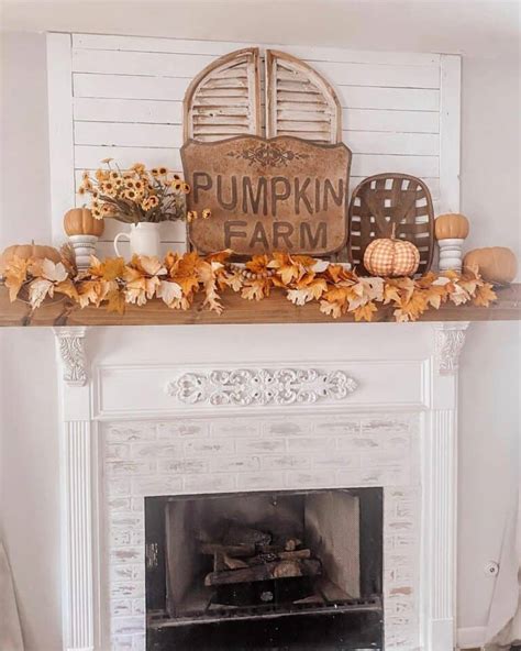 Stained Wood Fireplace Mantel With Fall Garland Soul And Lane