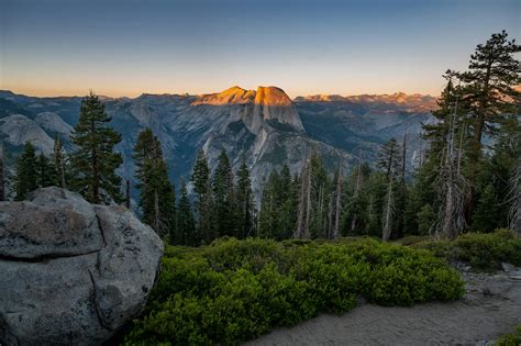 Sunrise Illuminates Half Dome Over The Yosemite Landscape Photo Free