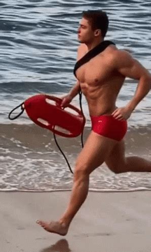 Lifeguard Muscular Guy  Lifeguard Muscular Guy Jogging Discover