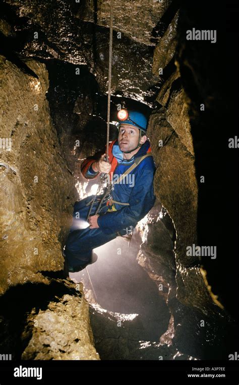 Caver Climbing A Rope Using Single Rope Technique Srt In A Peak