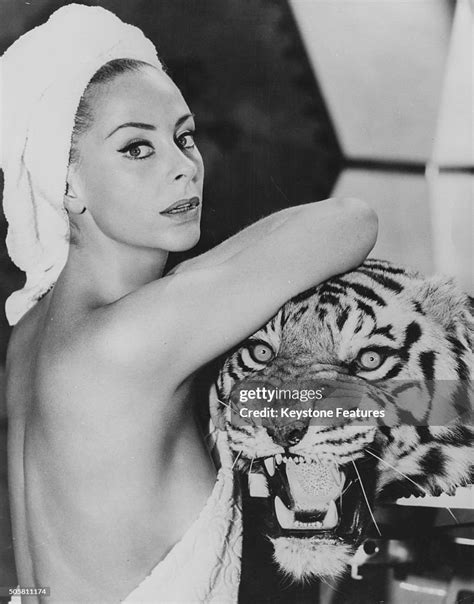 Portrait Of Actress Genevieve Page Wearing Nothing But A Towel As She