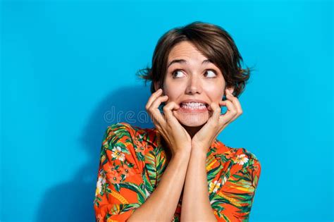 Photo Of Anxious Frightened Girl Biting Fingers Watching Horror Movie