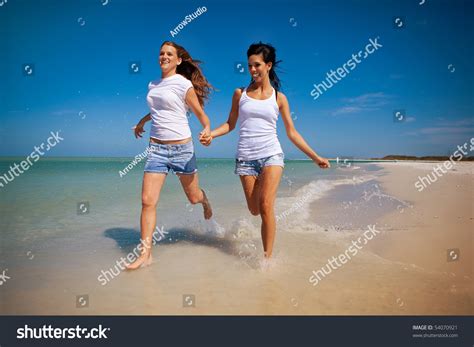 Lesbian Couple Running On Beach Foto Stok 54070921 Shutterstock