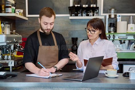 Team Male And Woman Talking Working Using Laptop Coffee Shop Stock Image Image Of Female