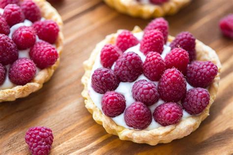 Premium Photo Tartlets With Raspberry