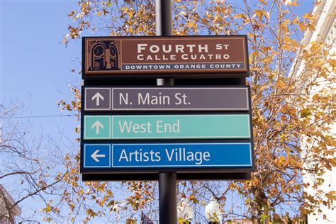 A Street Sign With Many Different Signs On It Photo Free California