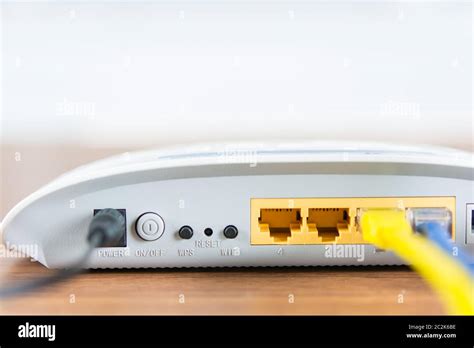 Wireless Modem Router Network Hub With Cable Connect On Wooden Table In The Room Stock Photo Alamy
