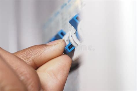 Adjusting The Settings On An Electrical Control Panel During Repairs