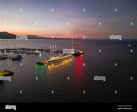 Night Time Sunset Drone Shot Boat Docked At Cairns Marina And Esplanade