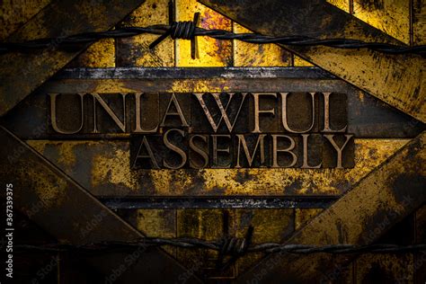 Unlawful Assembly Text Formed With Real Authentic Typeset Letters On
