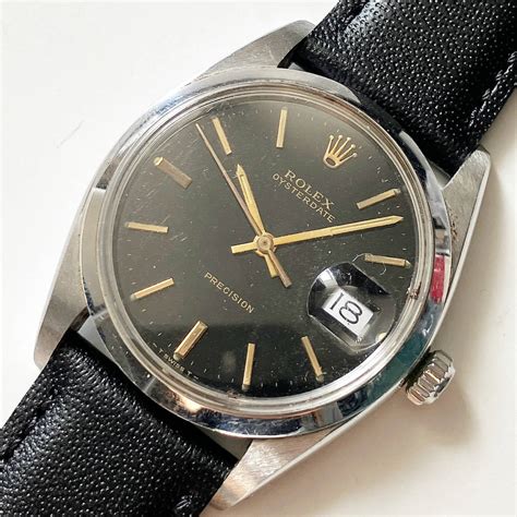 ロレックス オイスターデイト 6694 Rolex Oyster Date 手巻き ブラック文字盤ゴールドインデックスその他｜売買された