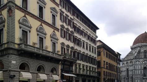 Facades Of Old Houses Of The Historical City With Balconies And Windows