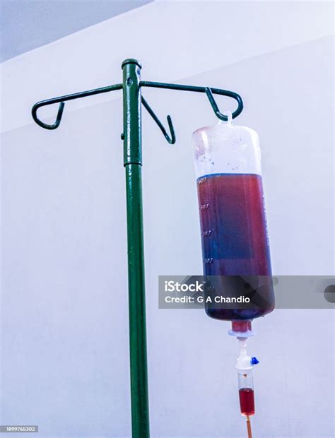 Intravenous Infusion Drip Bottle Of Solution Fluid Saline Mixed With