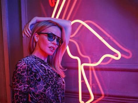 ‘my Name Is Kylie Ill Be Your Purser Ms Minogue Rocks Her Light Years Sunnies Kylie