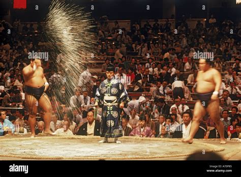 Pre Fight Sumo Wrestling Ceremony Of Tossing Salt Into Ring Or Dohyo