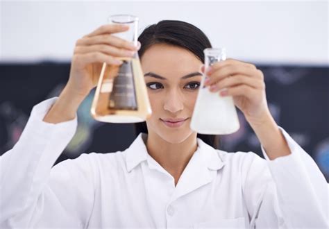 Premium Photo Woman Laboratory And Science Beakers For Medical Experiment For Investigation
