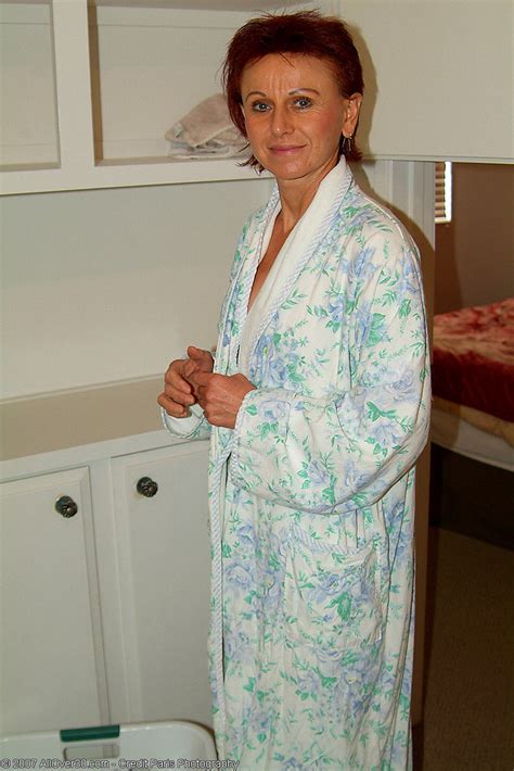 Redheaded Milf With A Hairy Pussy Leaves Her Bathrobe Undone Porn