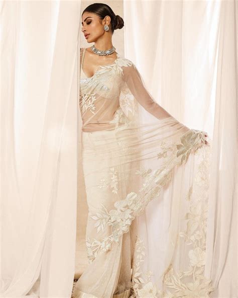 Mouni Roy And Esha Gupta Exude Glitter And Glamour In Ivory See Through