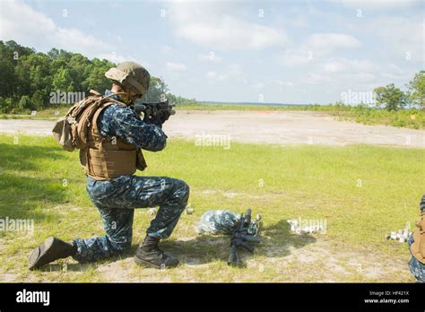 Us Naval Academy Midshipman Daniel Lindauer Fires An M240 Machine Gun During Professional