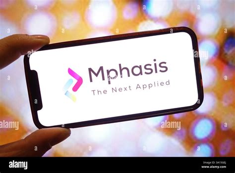 In This Photo Illustration The Mphasis Limited Company Logo Is Seen Displayed On A Smartphone