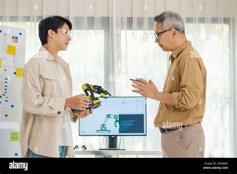 Engineering Robot Technology With Asian Programmer Innovation And