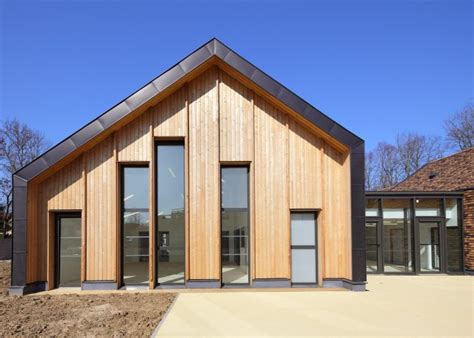 Brown Ceramic Shingles Cover Nomade Architects Village Like Nursery