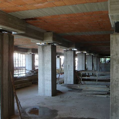 Installing Base Isolator In A Building Civilengineeringblog