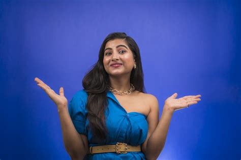Happy Indian Girl Pointing Hands Sideways Pixahive