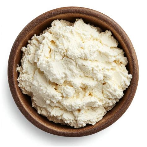 A Bowl Of Rich Creamy Ricotta Cheese With A Smooth Texture Isolated