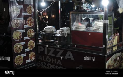 Pizza Maker Outdoors At Street Food Stall On Oknha Tep Phan Street 182 Phnom Penh Cambodia Stock