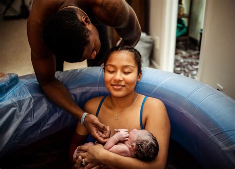 Woman Giving Birth At Home