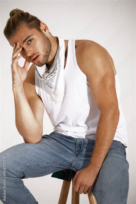 Sexy Sport Muscle Strongface Blond Guy With Long Hair In Denim Blue
