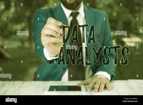 Writing Note Showing Data Analysts Business Concept For Programmer