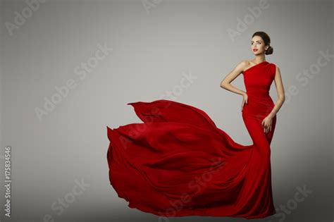 Fashion Model In Red Beauty Dress Sexy Woman Posing Evening Gown