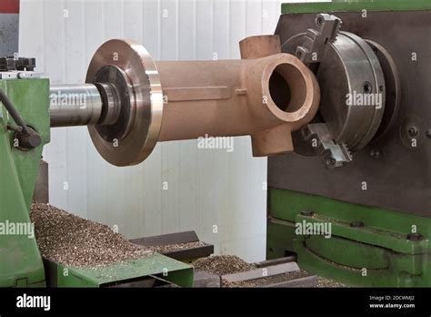 cnc lathe machine with lathe and milling tool turning an industrial