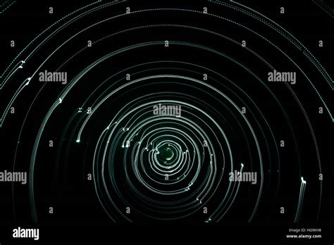 Colorful Abstract Trails Of Light Dots Lines And Bokeh On Dark Background Long Exposure Stock