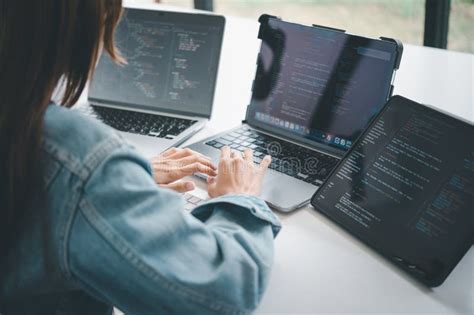 female programmer working on coding software development and web