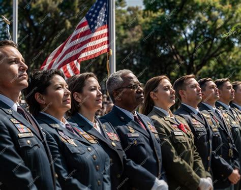 Solemn Ceremony At A Veterans Day Memorial With A Diverse Group Of