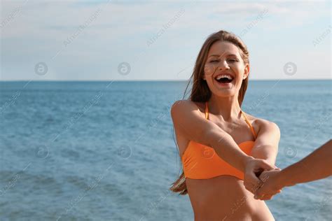 Young Woman In Bikini With Girlfriend On Beach Lovely Couple Stock