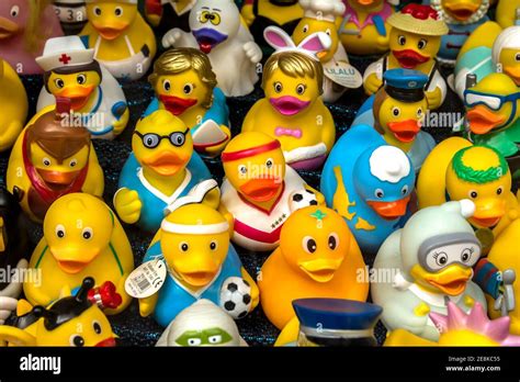 Collection Of Various Rubber Ducks In A Shop Window Of A Souvenir Store