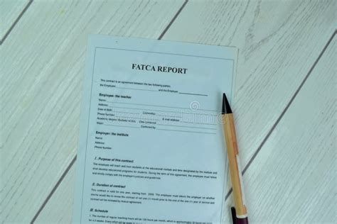 Concept Of Meaning From 8966 Fatca Report Isolated On Wooden Table