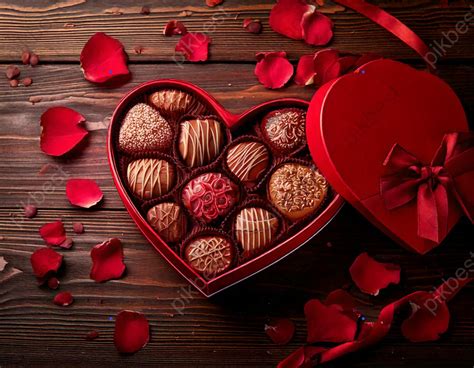 Heart Shaped Chocolate Box Filled With Assorted Chocolates Backgrounds
