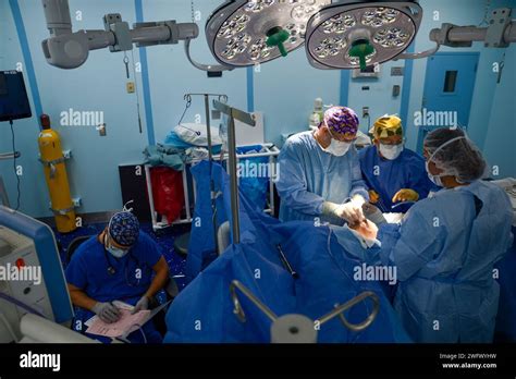 Us Navy Surgeons Assisted By Hospital Corpsmen Perform A Left Flank