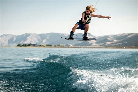 A Man Jumping On A Wakeboard Photo Free Usa Image On Unsplash