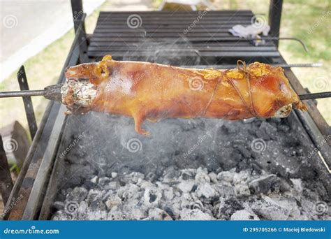 Close Up Photo Of A Roasted Guinea Pig On A Grill Selective Focus