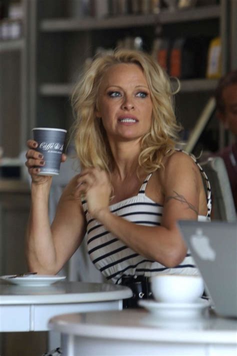 Reflecting On The Barbwire Bicep Tattoo
