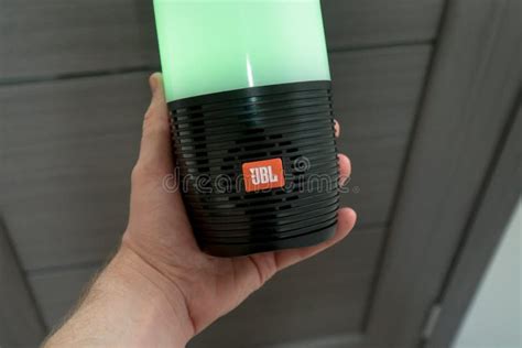 DUBAI UAE MARCH 14 2019 JBL Bluetooth Speaker Close Up In The Hotel Room Man Holds JBL