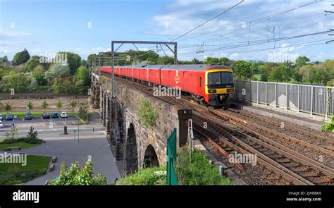 Db Cargo Royal Mail Train Formed Of A Class 325 Freight Unit Crossing