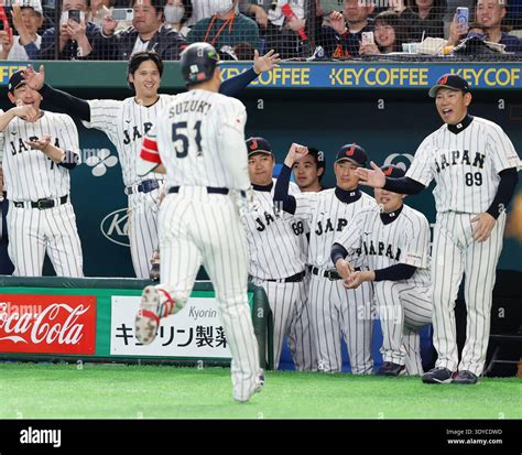 Seiya Suzuki Of Japan Is Celebrated After Hitting Home Run In The 3rd